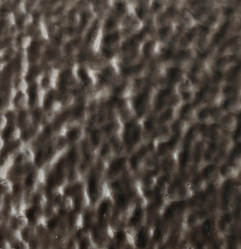 Custom Liquid Metal Wall Panels | Textured Interior Design